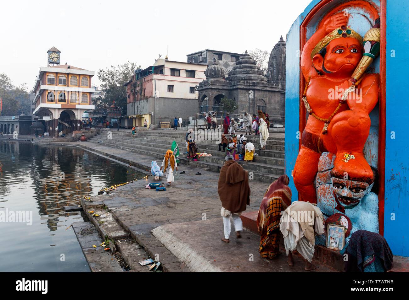 India, Maharashtra, Nashik, pilgrims on the ghats at sunrise near ...