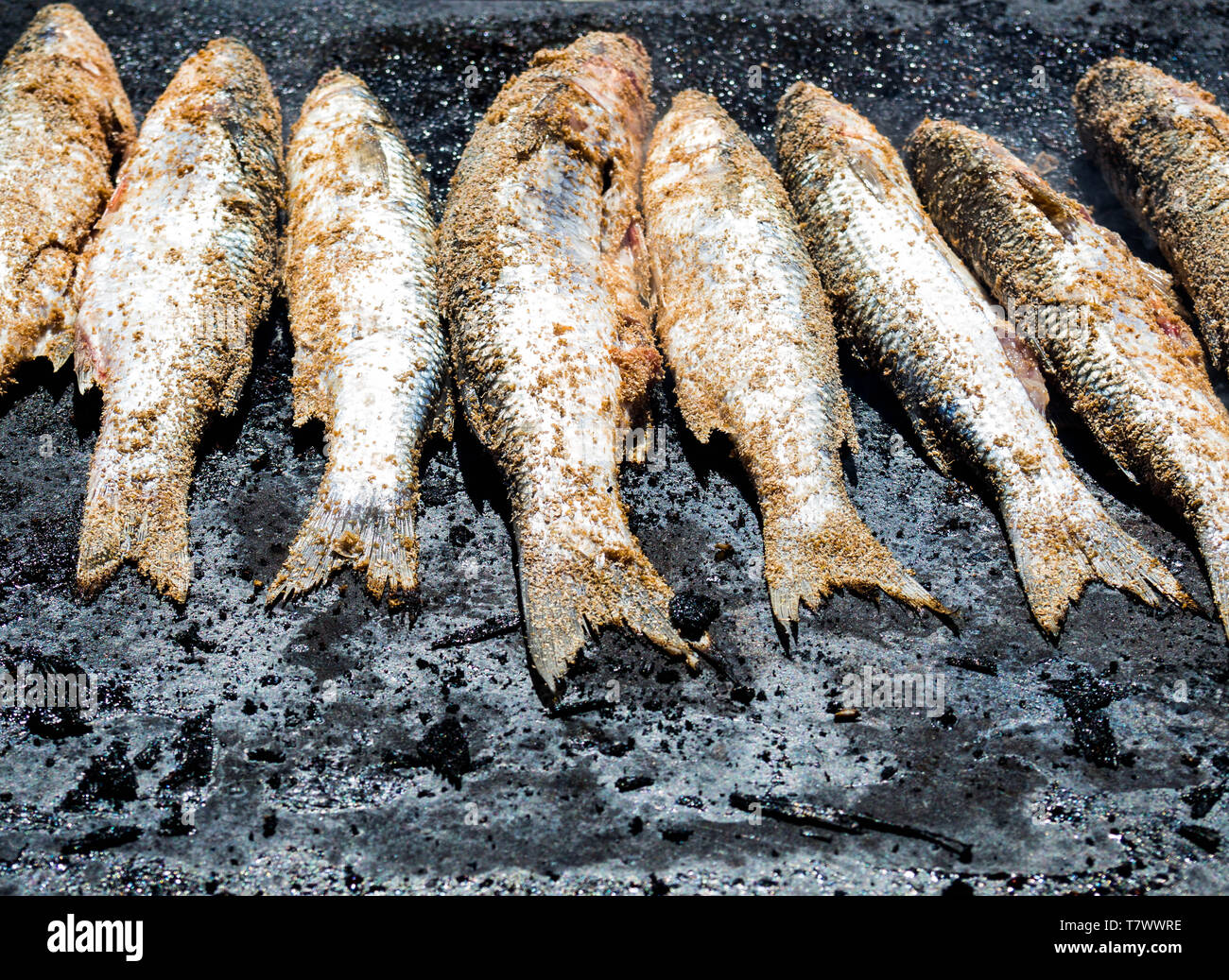 grilled fish on the grill in hotel outdoor, closeup Stock Photo - Alamy
