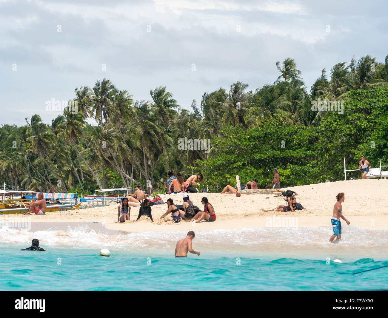 Apr 27, 2019 Travelers who relax on the Daku island beach, Siargao ...