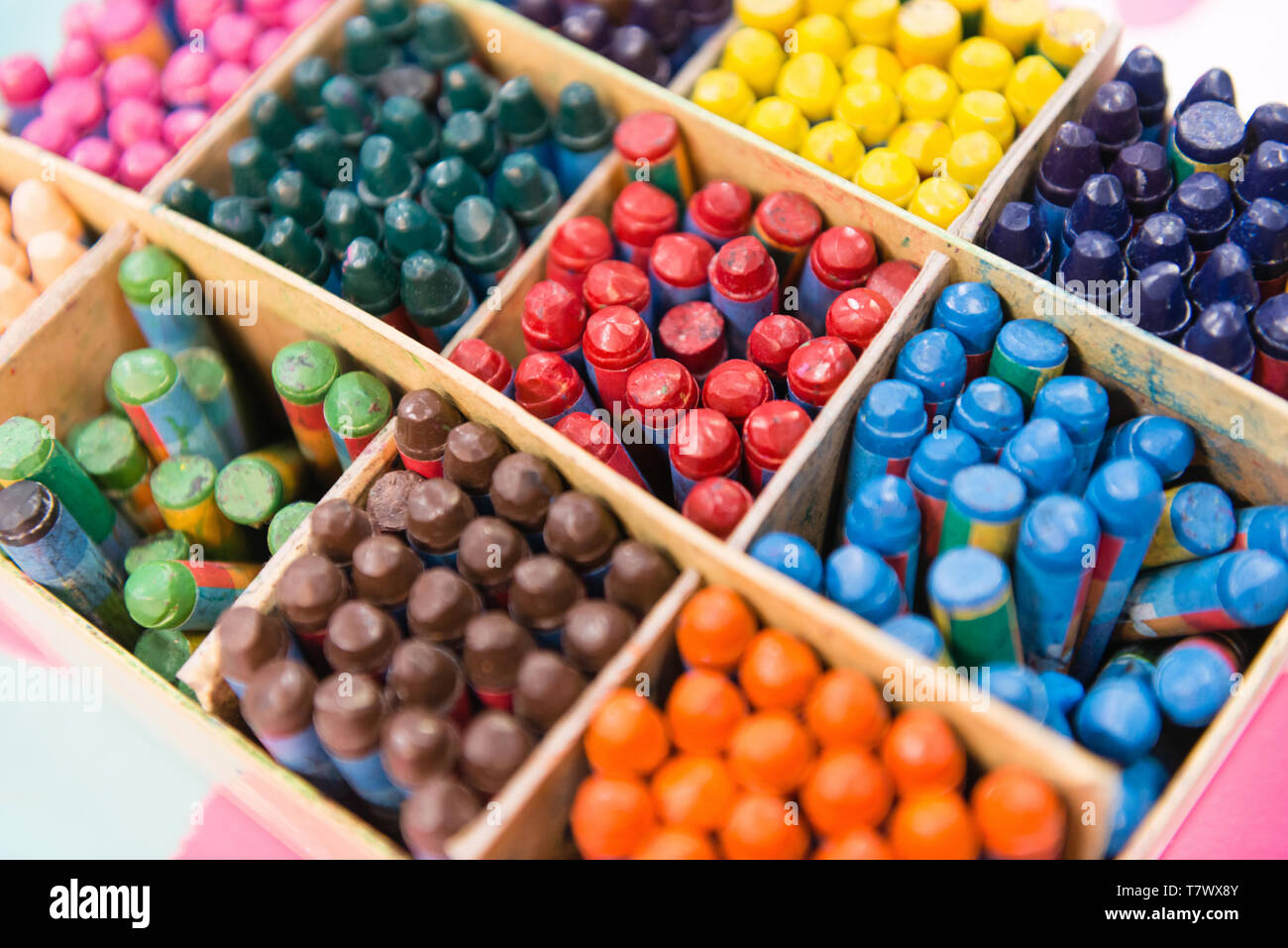 Multi color wax crayons in the box Stock Photo - Alamy