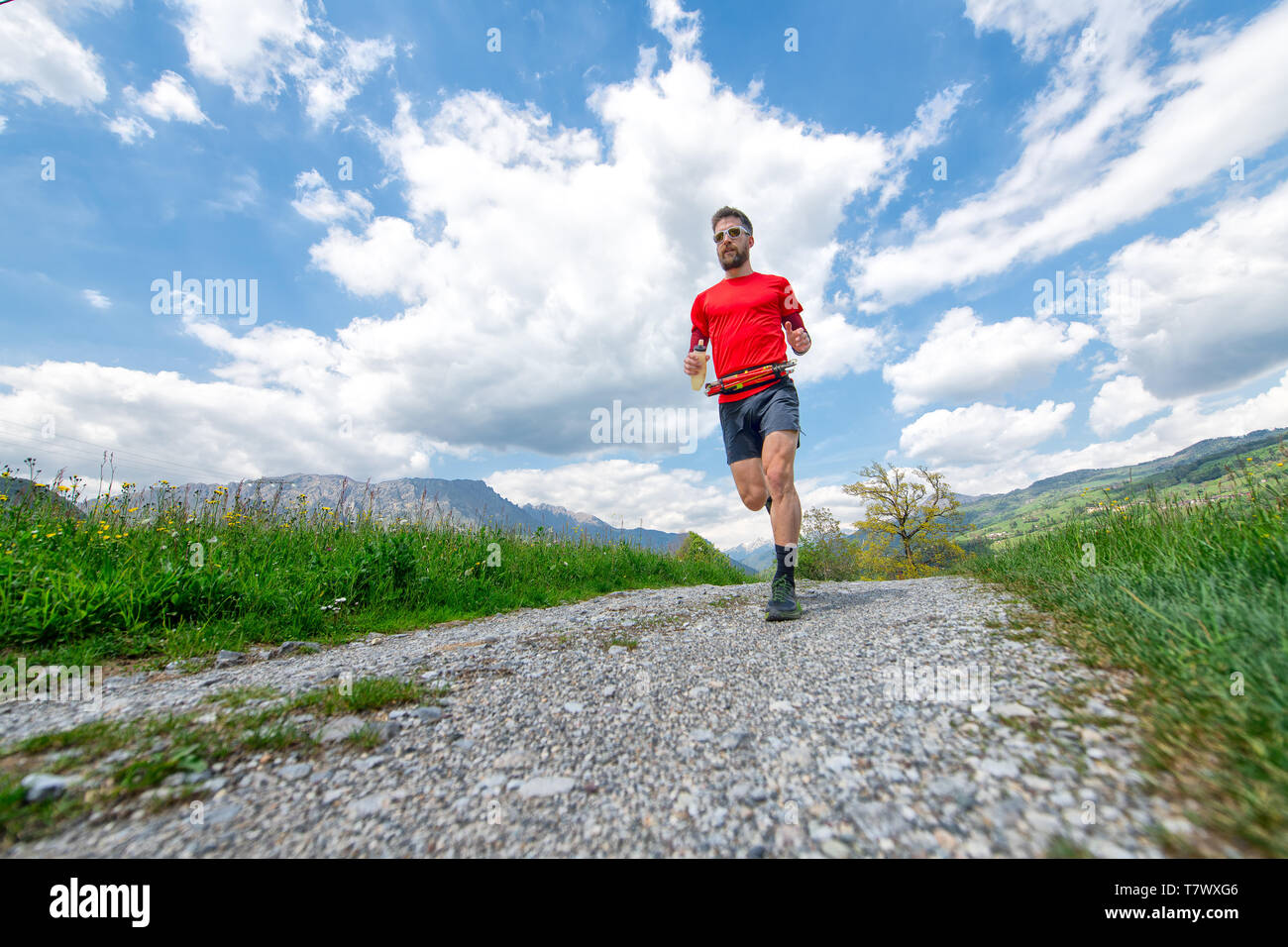 Runner on the road hi-res stock photography and images - Alamy