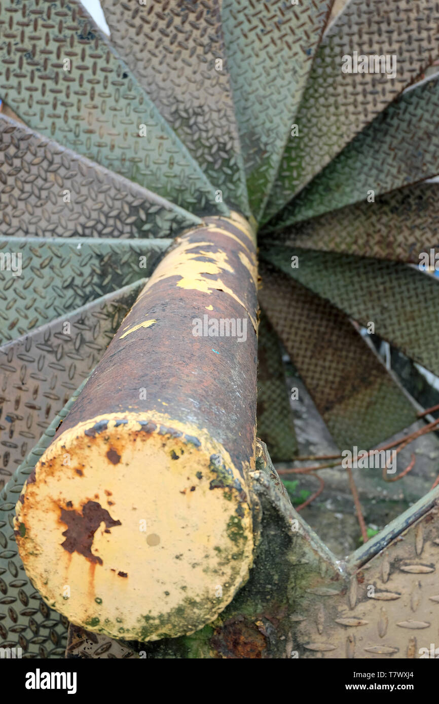 old rusty spiral metal ladder Stock Photo - Alamy