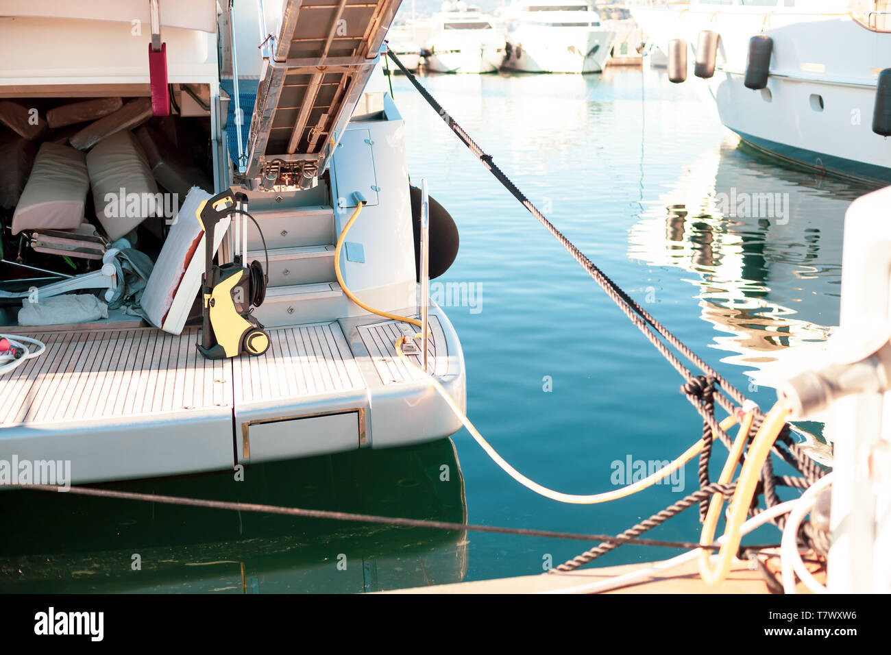 Cleaning service on yacht in Marina of Cannes, French Riviera, France ...