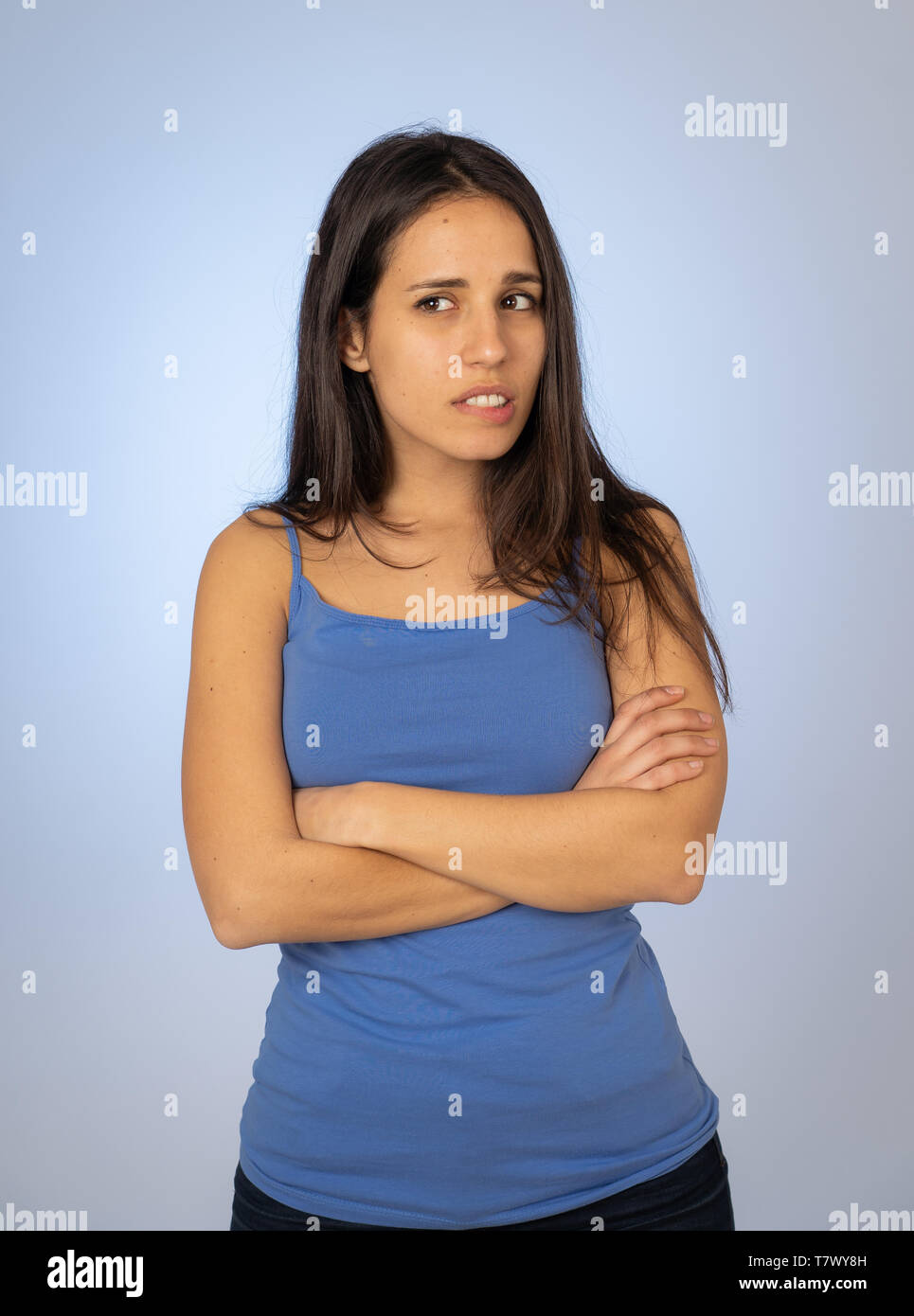 Woman crossed arms hi-res stock photography and images - Alamy