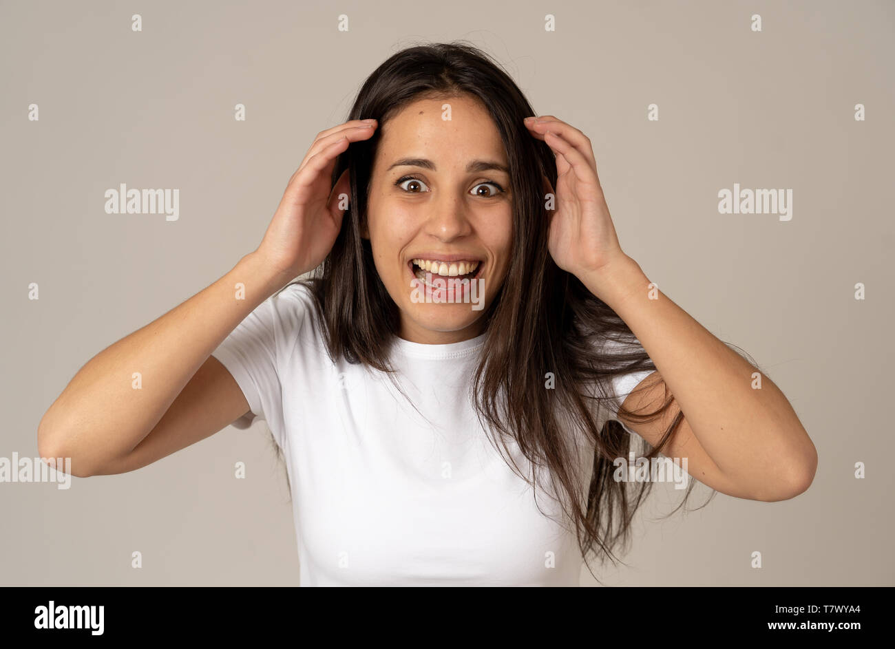 Portrait of beautiful shocked woman hearing good news or having great ...
