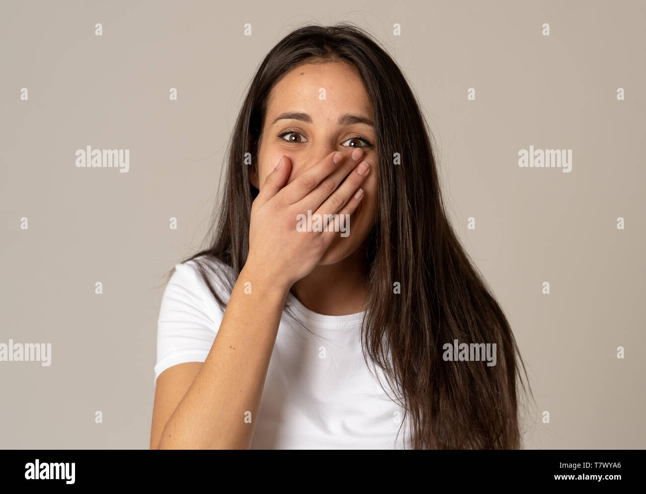 Portrait of beautiful shocked woman hearing good news or having great ...