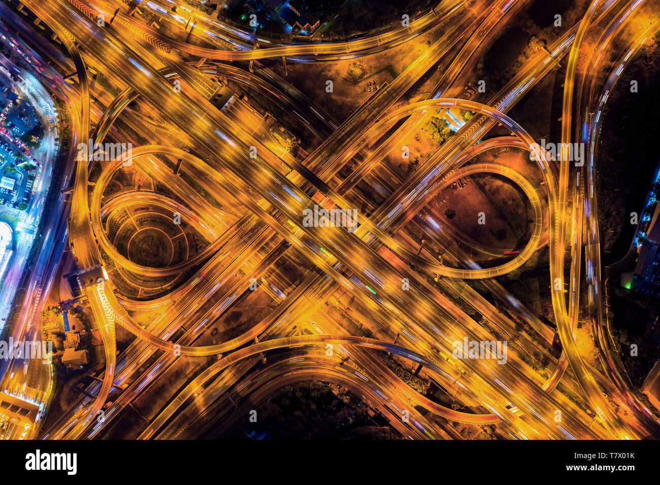 Aerial view of traffic on massive highway intersection at night Stock ...