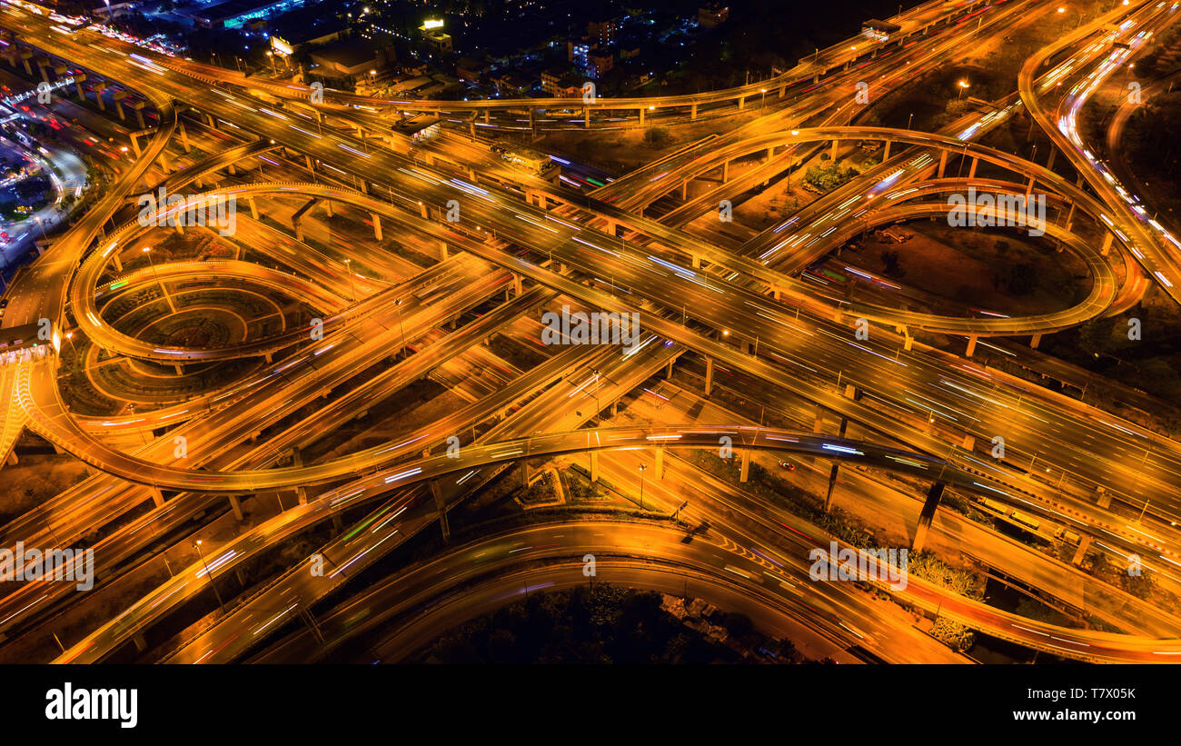 Aerial view of traffic on massive highway intersection at night Stock ...