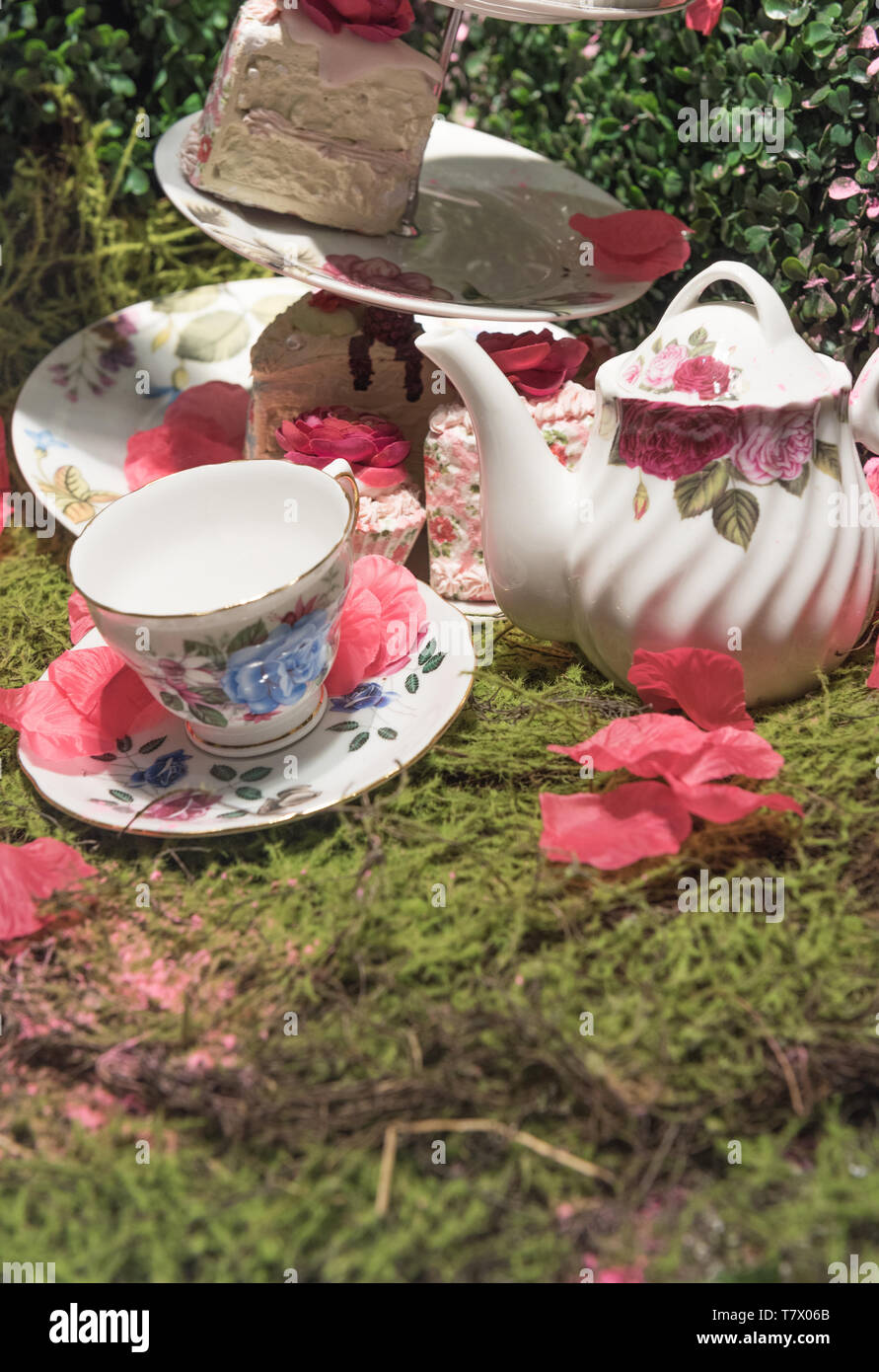 Luxurious Cream Tea Picnic Party Scene with Flower Petals and Old ...