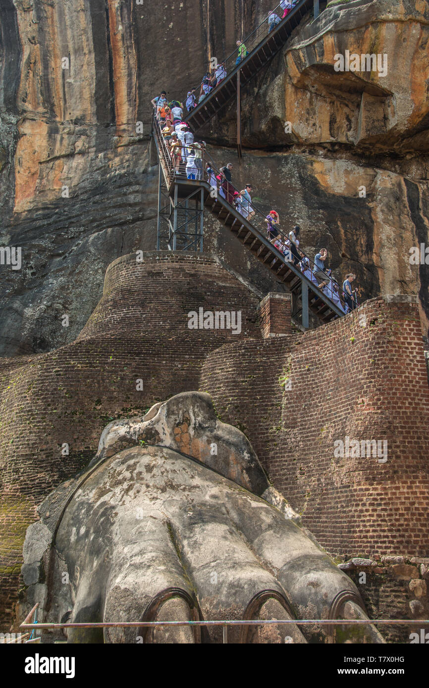 Massive lion's paws flank the entrance to the steps leading up from the ...