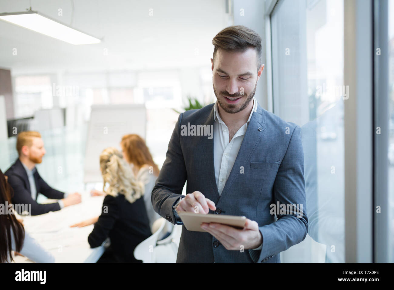 Handsome male architect working hi-res stock photography and images - Alamy