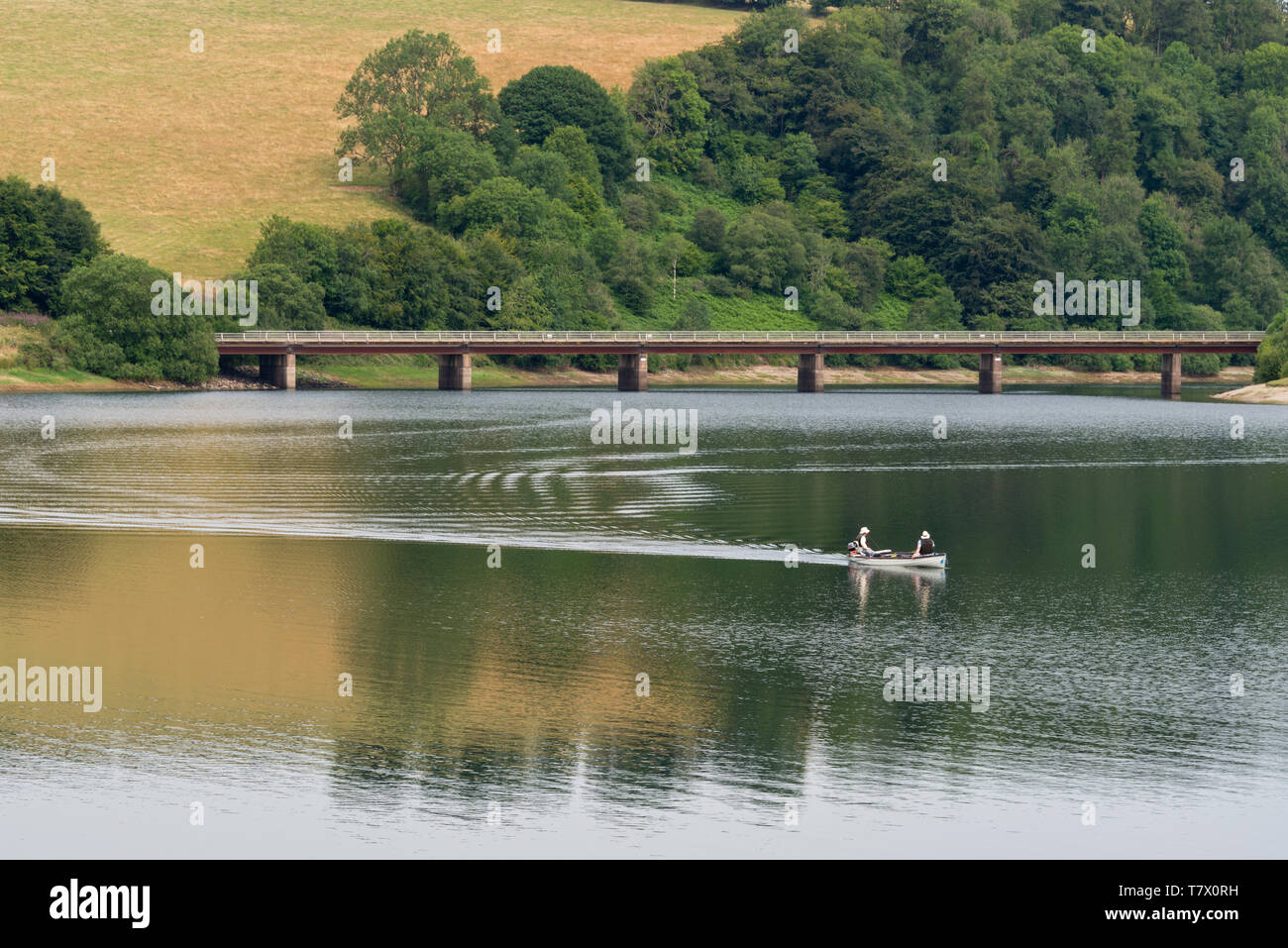 Anglers out on Wimbleball lake with Bessom Bridge in the background ...