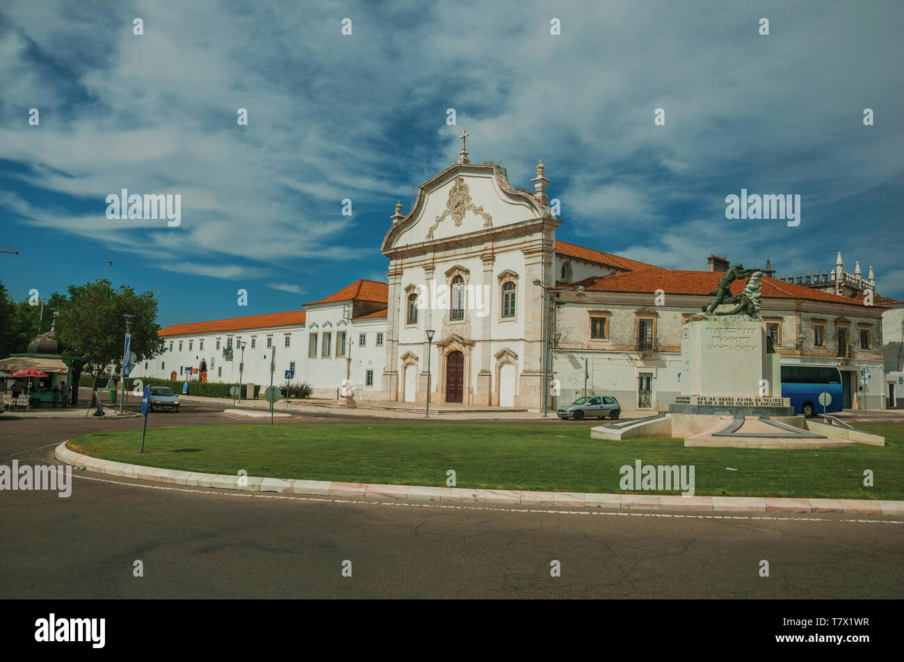 Street roundabout with monument and building in baroque style at ...