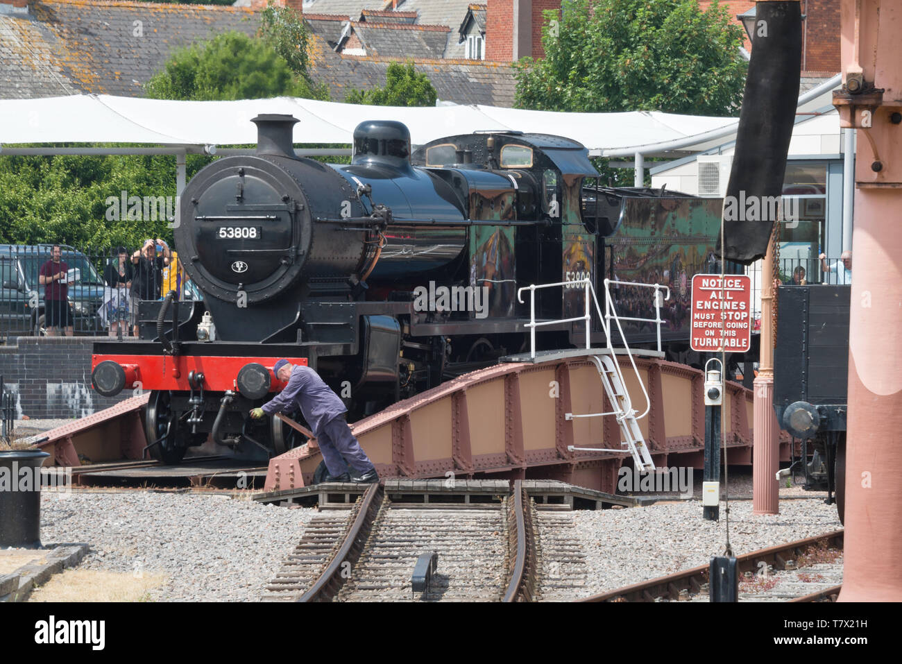 Steam locomotive 53808, 2-8-0, a heavy freight train, at the turntable at Minehead station on ...