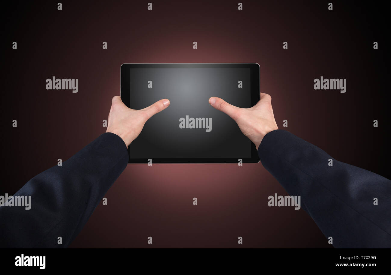 Hand using tablet with no concept and empty space Stock Photo - Alamy