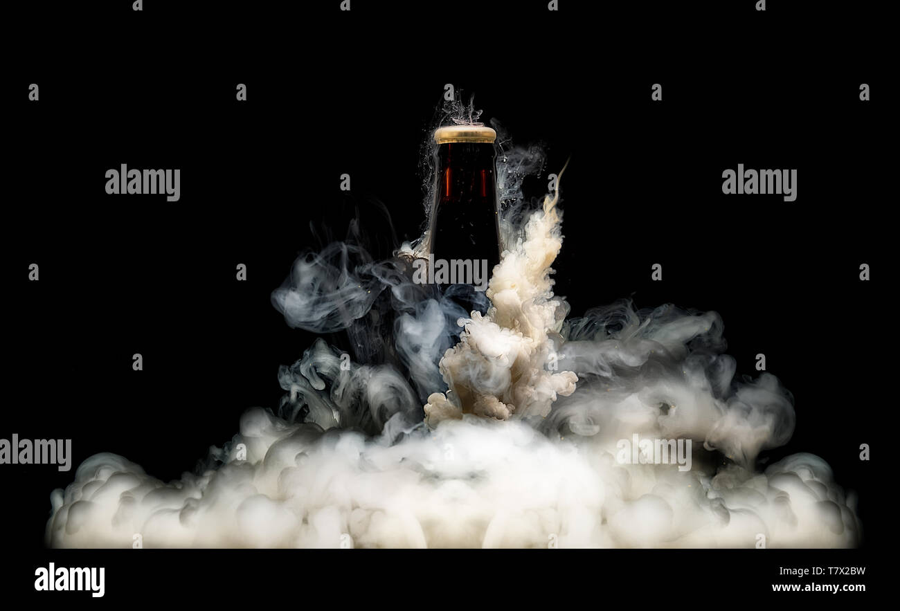 Liquid water explosions surrounding beer bottle. Underwater liquid ...