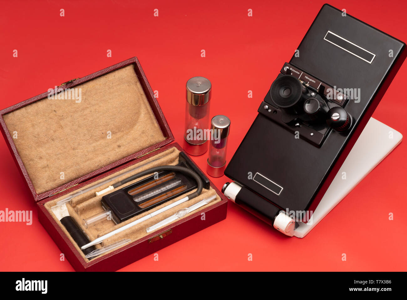 set of historic medical instruments used for blood analysis in red back ...