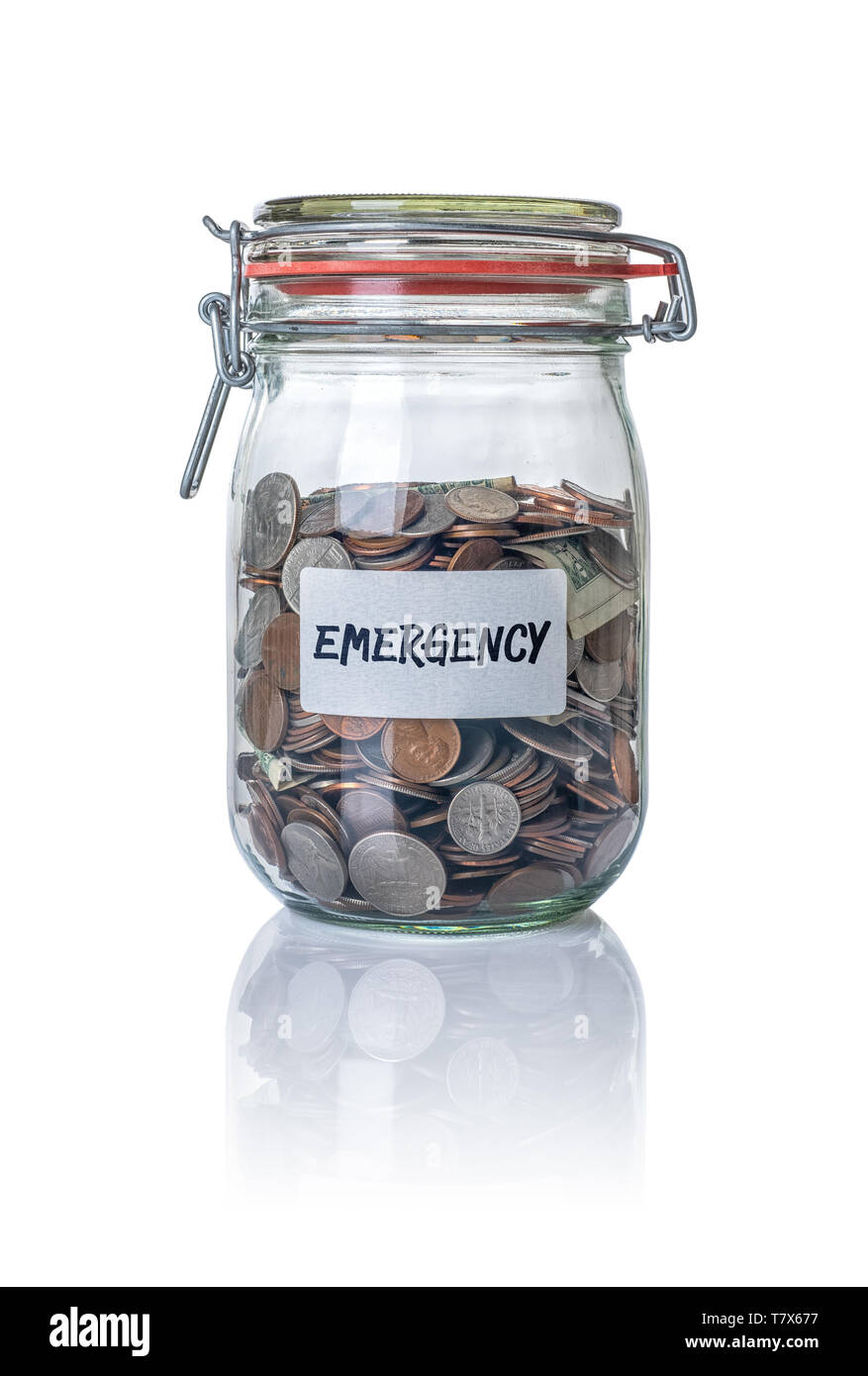 Isolated jar filled with coins labeled Emergency Stock Photo - Alamy