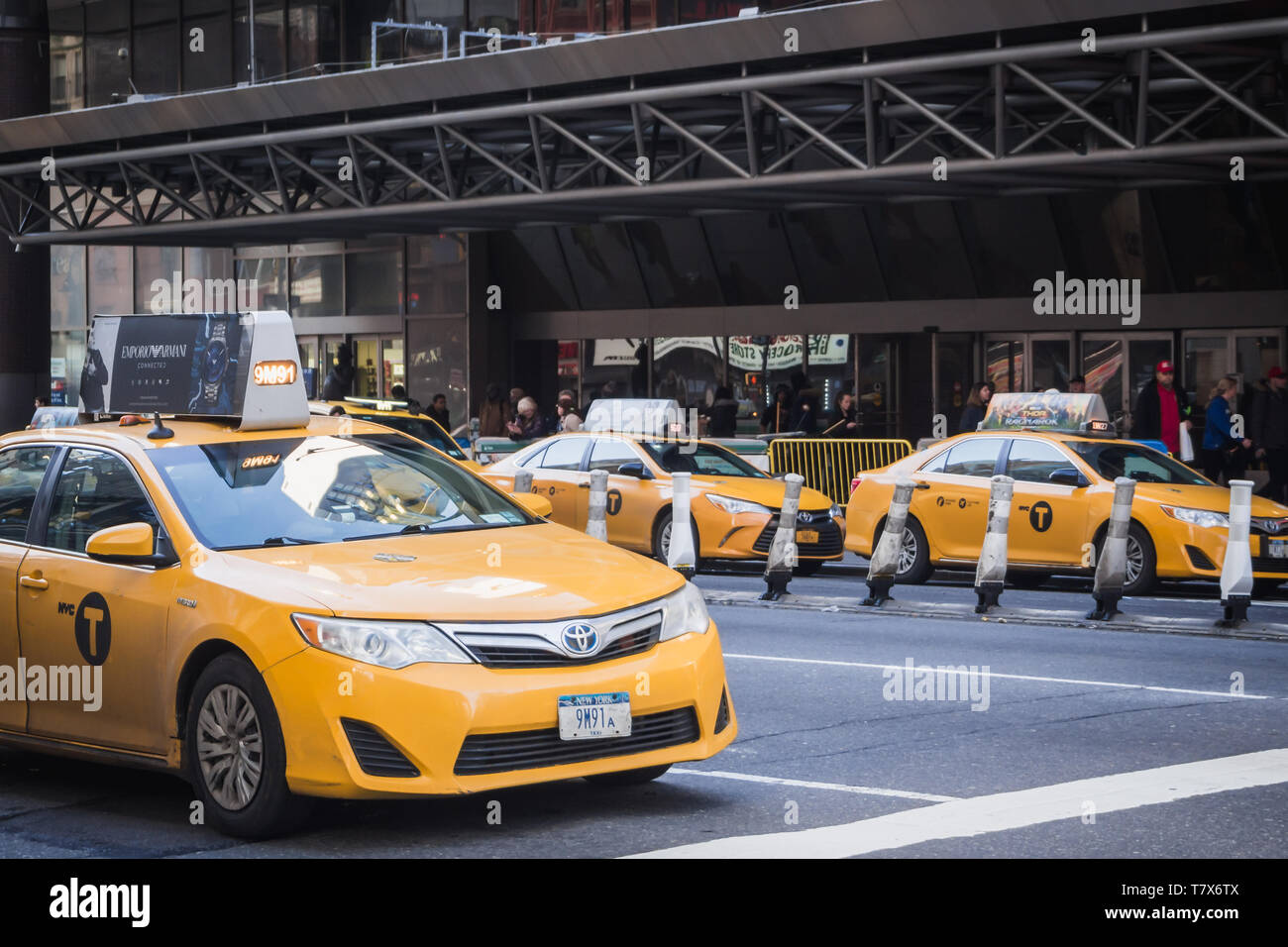 NEW YORK,USA - FEBRUARY 24, 2018: Line of Famous New York Yellow Taxi ...