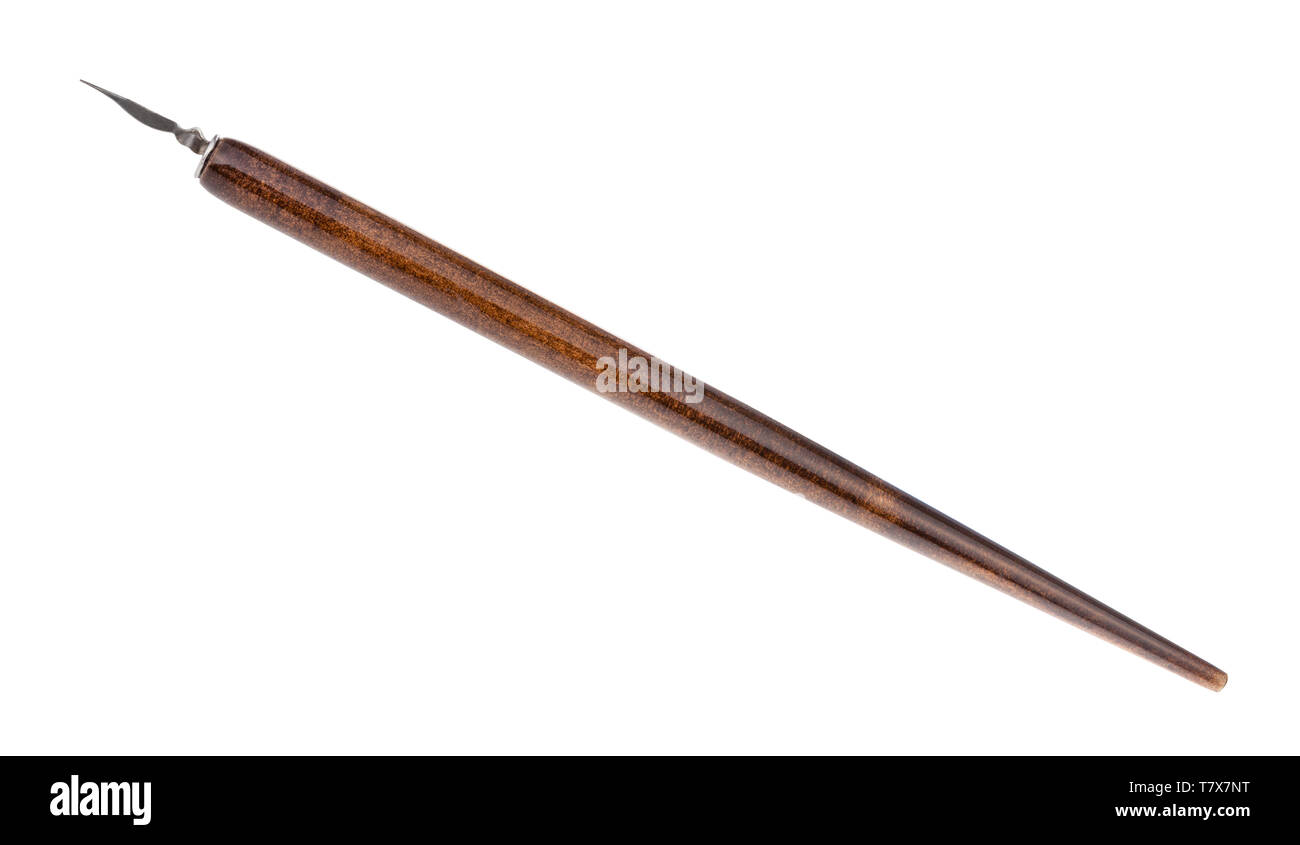 side view of dip pen with sharp steel nib and wooden brown penholder ...