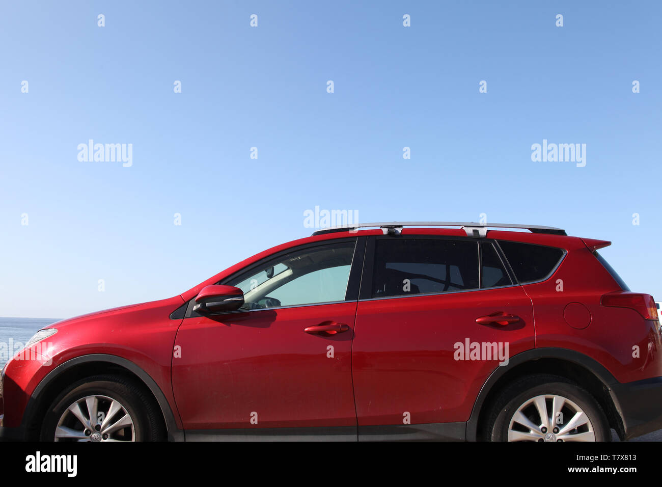 Top of Toyota RAV4 car side view of roof line showing blue sky ...