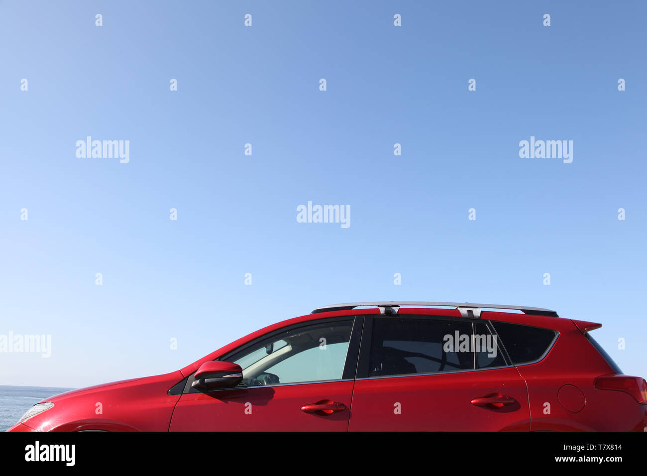 Top of Toyota RAV4 car side view of roof line showing blue sky ...