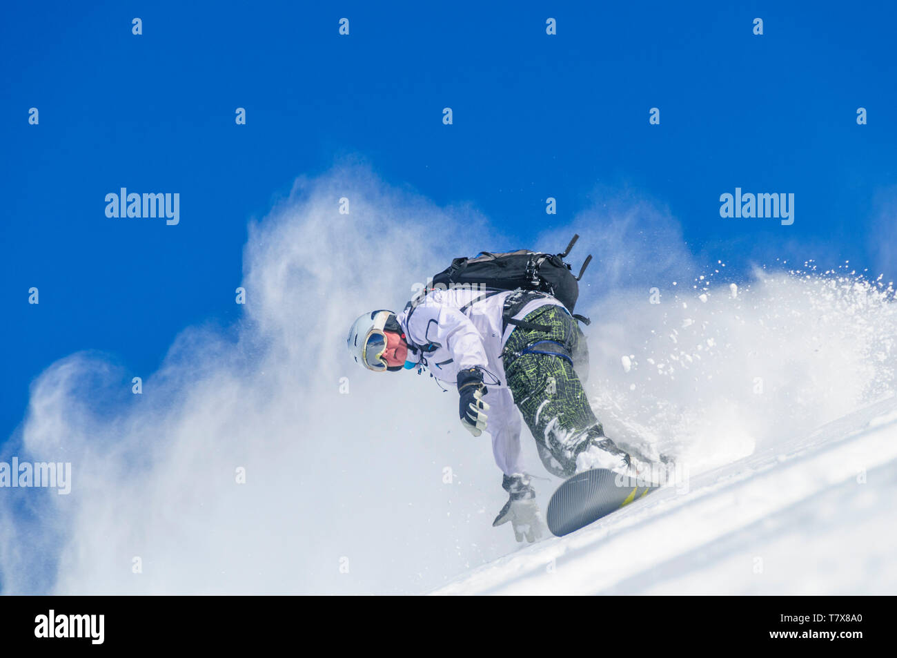 Snowboarder during a downhill in backcountry Stock Photo - Alamy
