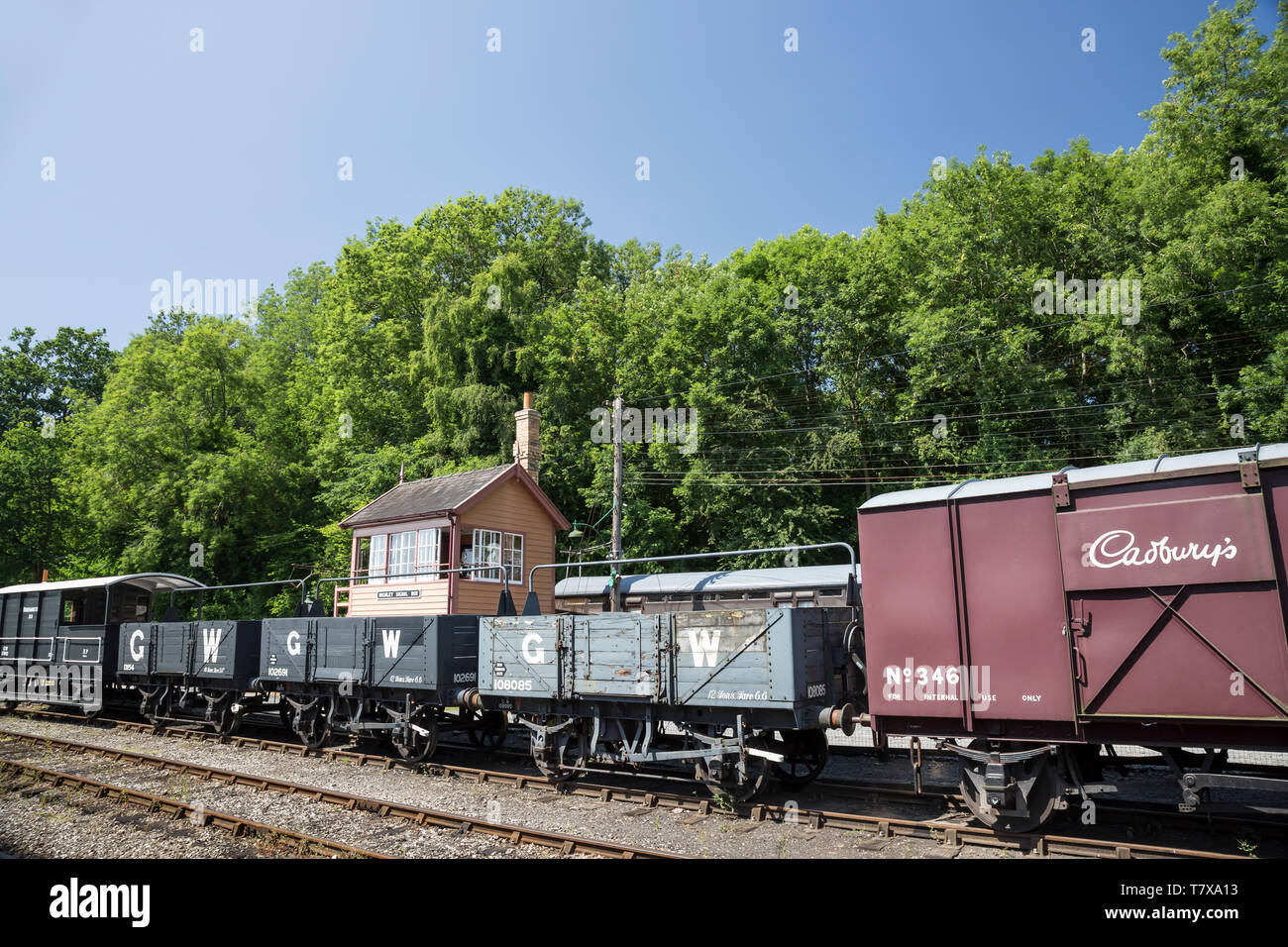 Vintage freight railway carriages (one: Cadbury's) on the line at ...