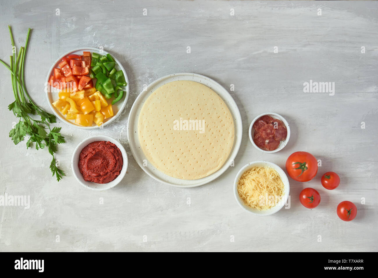 Preparing individual pizzas from pizza bar Stock Photo - Alamy