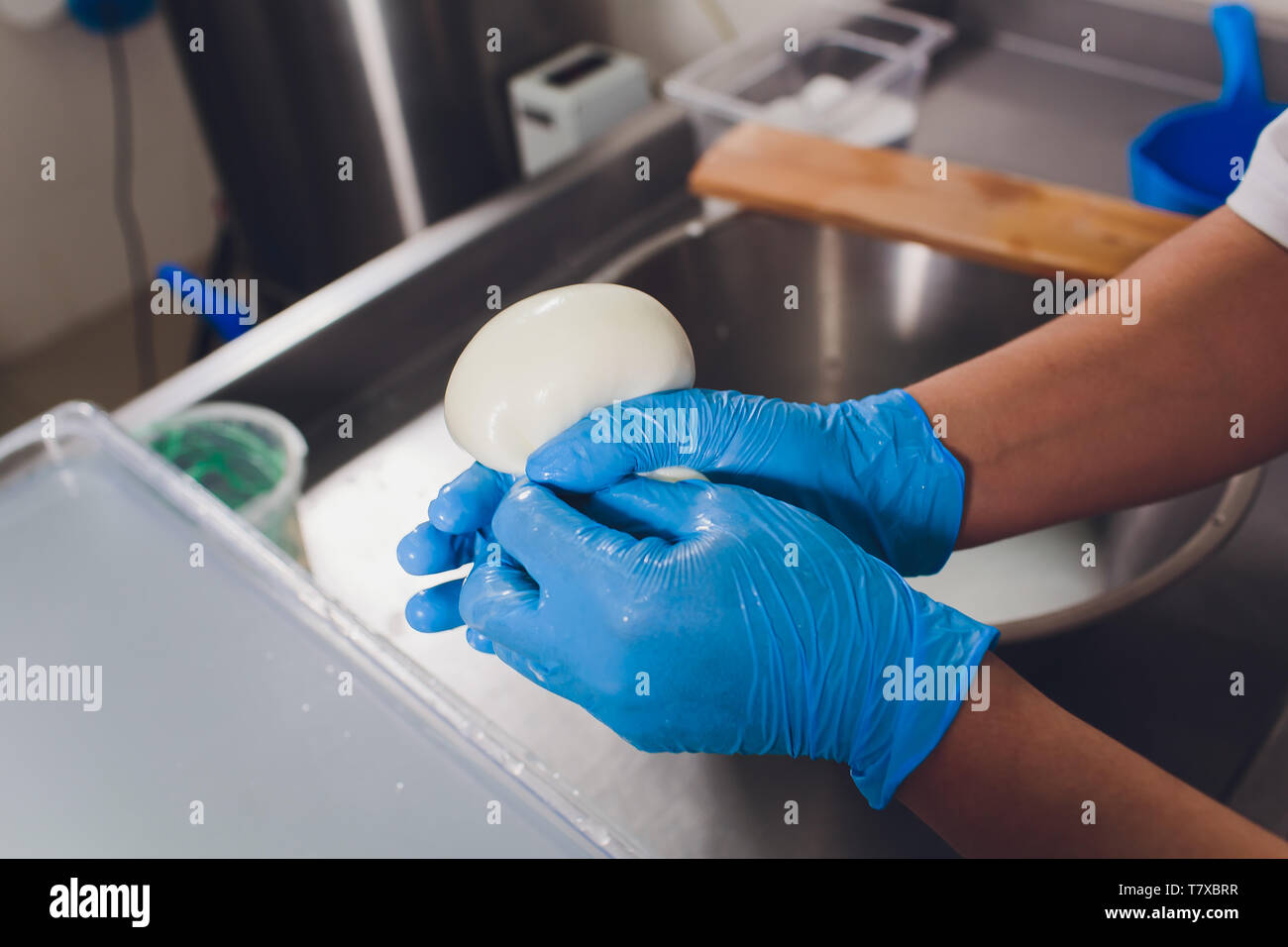 Production process of mozzarella cheese, cheese making process Stock ...
