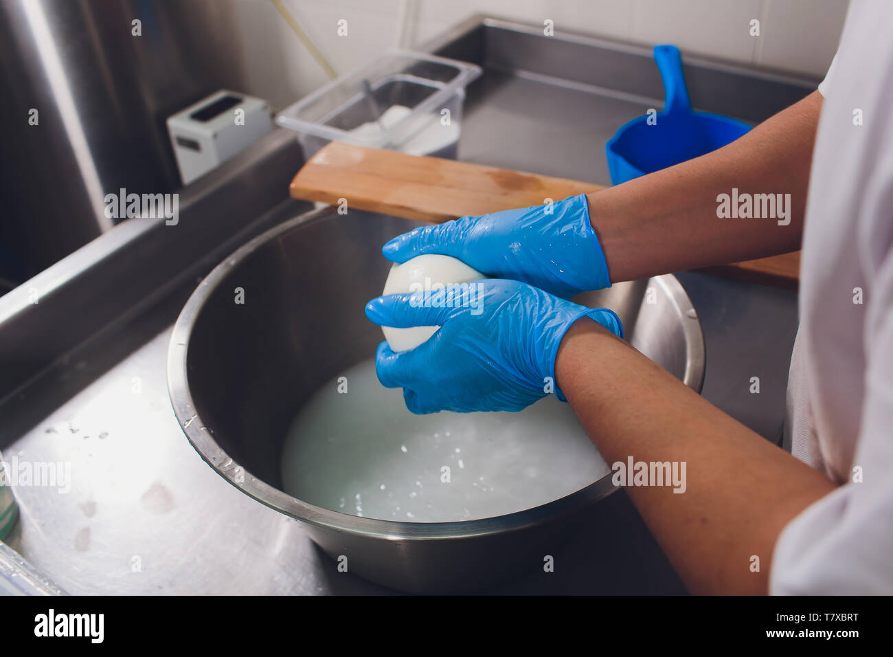 Production process of mozzarella cheese, cheese making process Stock ...