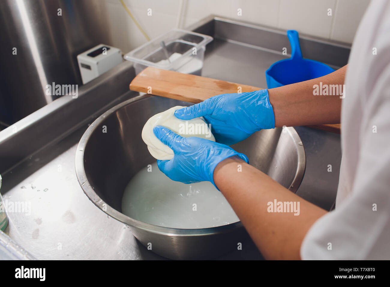 Production process of mozzarella cheese, cheese making process Stock Photo - Alamy