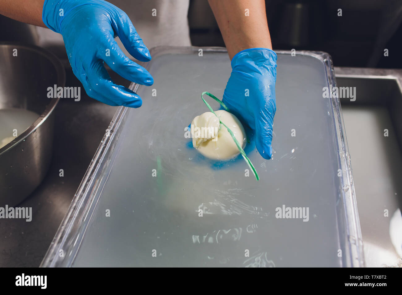 Production process of mozzarella cheese, cheese making process Stock ...