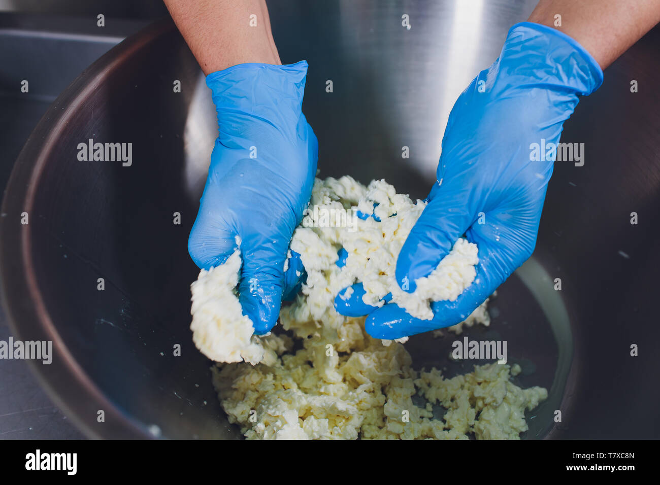 Traditional Cheese Making In A Small Company. Cheese Maker Hands Close ...