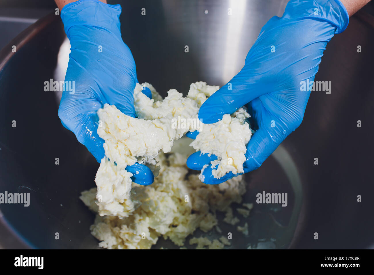 Traditional Cheese Making In A Small Company. Cheese Maker Hands Close ...