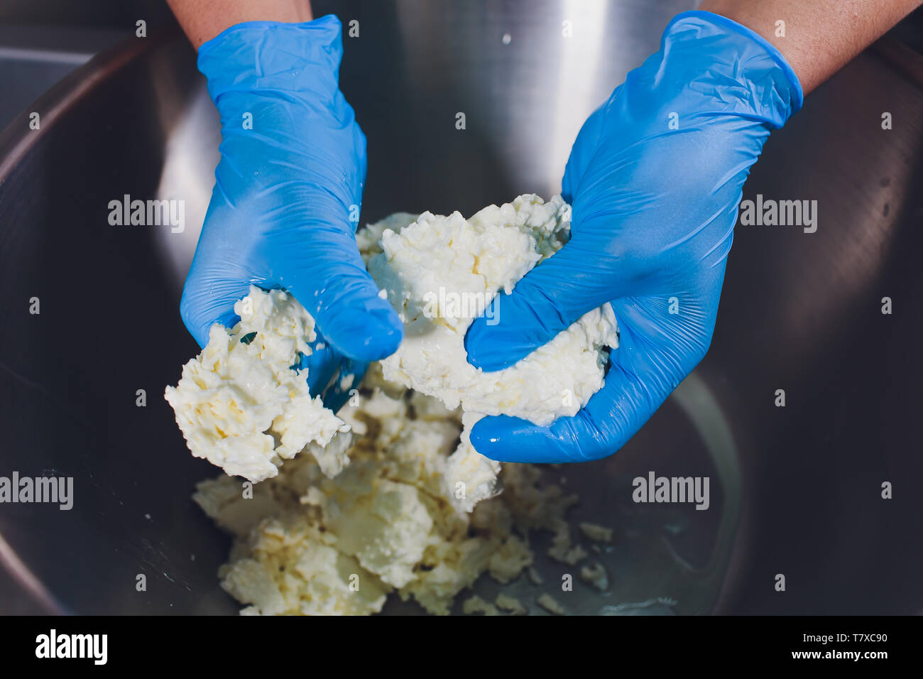 Traditional Cheese Making In A Small Company. Cheese Maker Hands Close ...