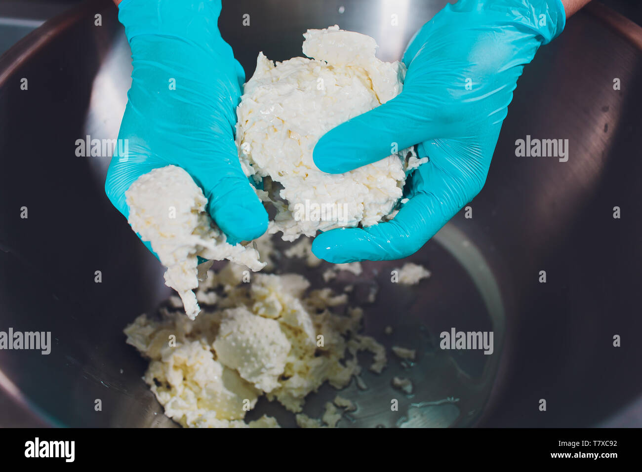 Traditional Cheese Making In A Small Company. Cheese Maker Hands Close ...
