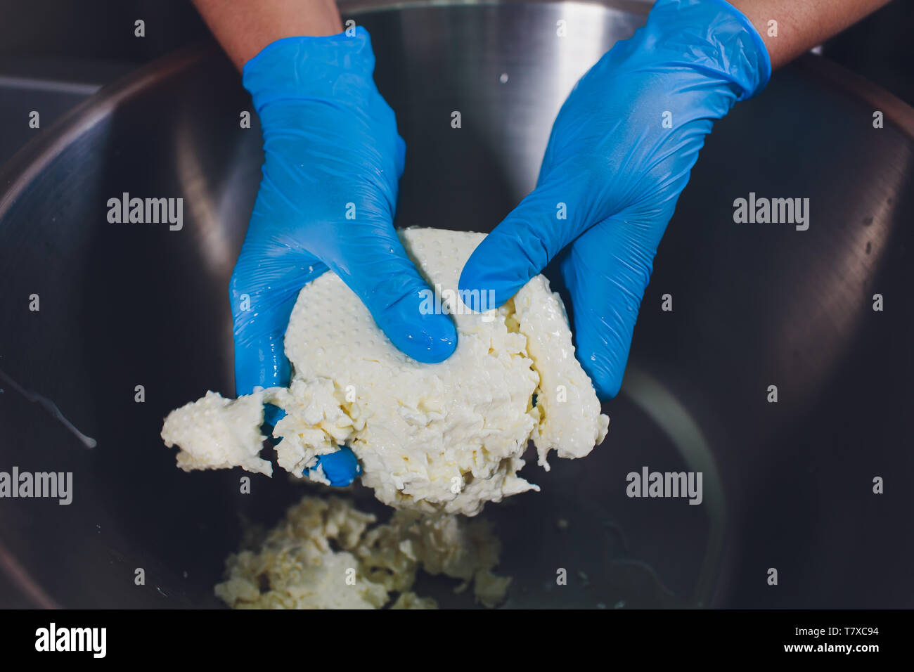 Traditional Cheese Making In A Small Company. Cheese Maker Hands Close ...