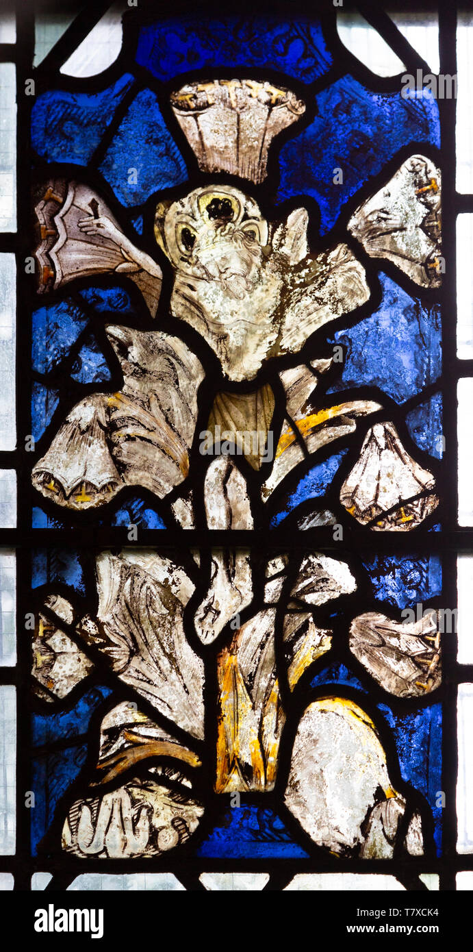 Medieval stained glass window of Jesus Christ crucified in shape of ...