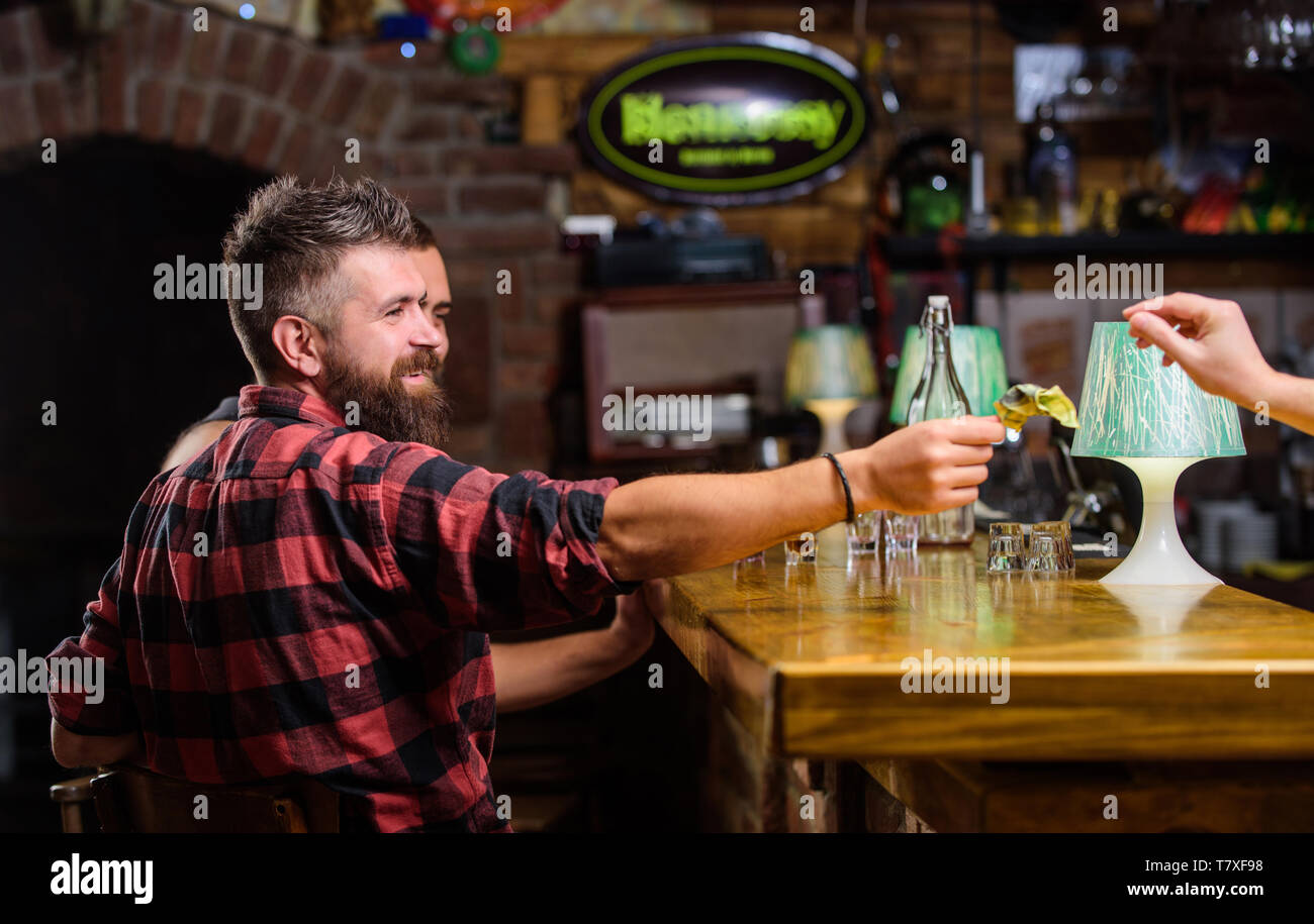 Cash money concept. Leave tips for bartender. Tip given to waiter. One ...