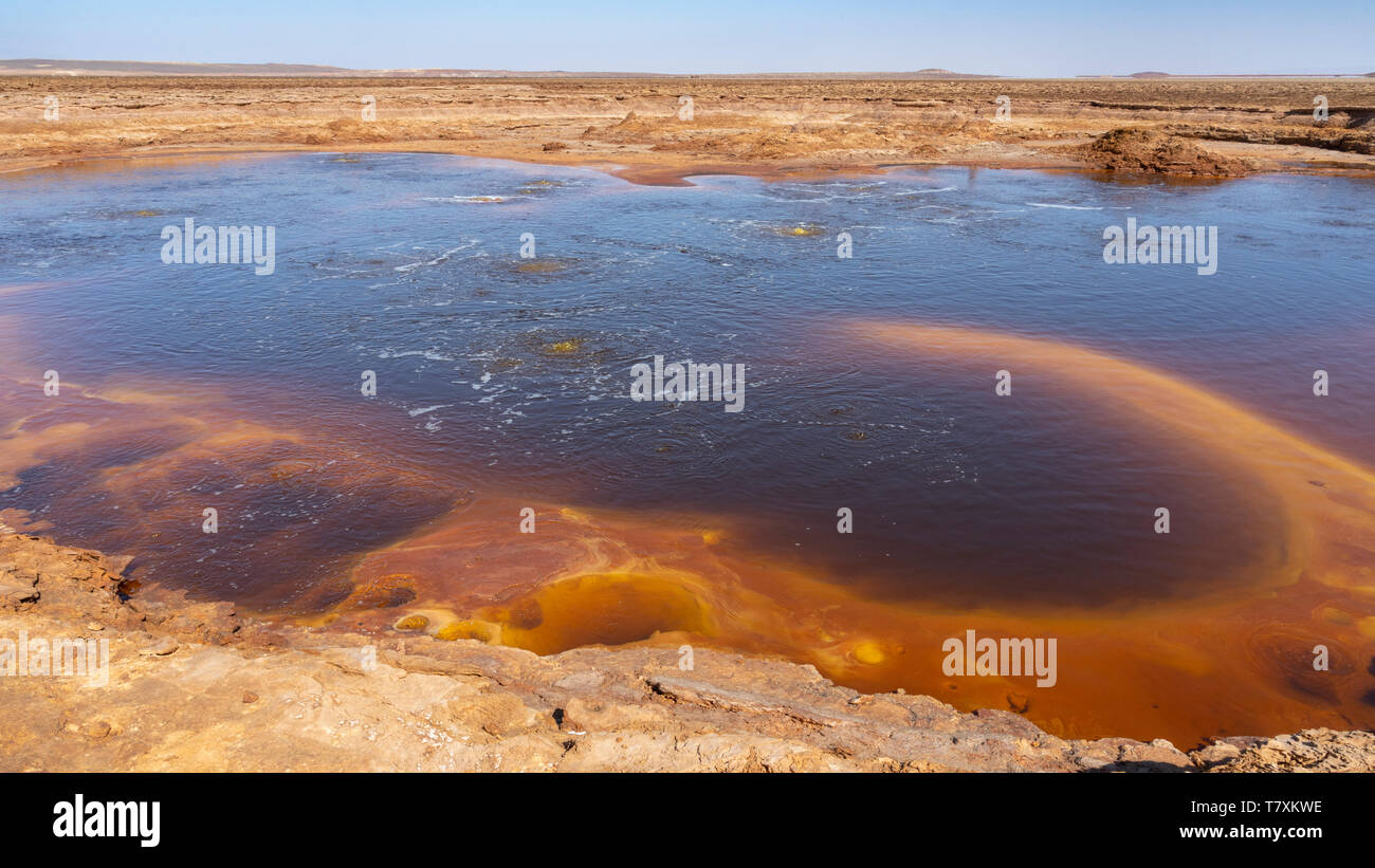 Acid bubbling pond in the Danakil depression in Ethiopia in Africa ...