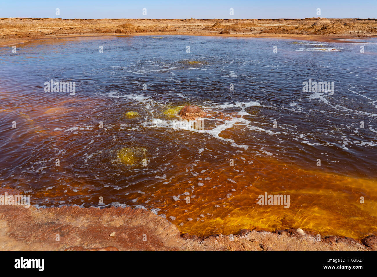 Acid bubbling pond in the Danakil depression in Ethiopia in Africa ...