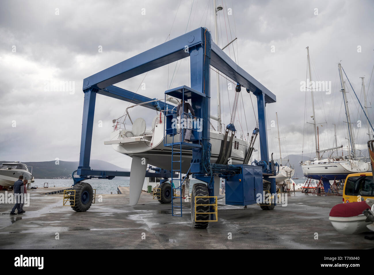 Crane lifting boatyard hi-res stock photography and images - Alamy