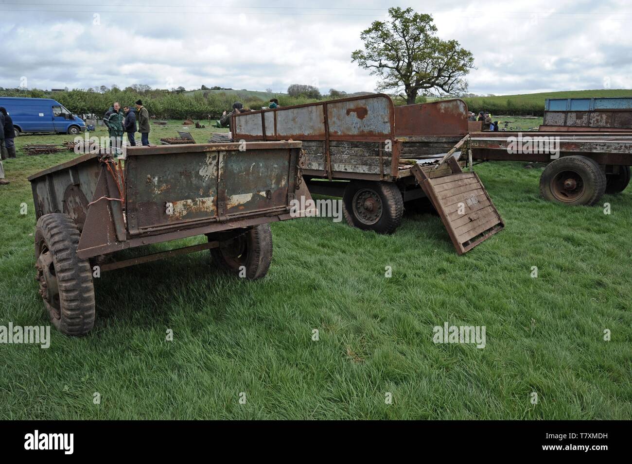 Old rusty agricultural trailers at a farm sale of vintage farm ...