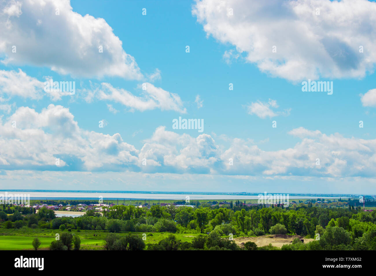 Cloudy sky above the water reservoir background. Abstract fpuffy ...