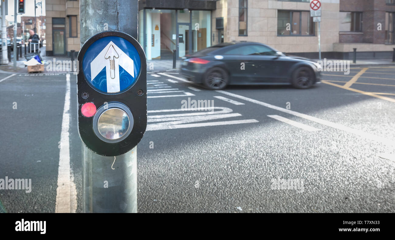 Dublin, Ireland - February 11, 2019: Button to activate pedestrian ...