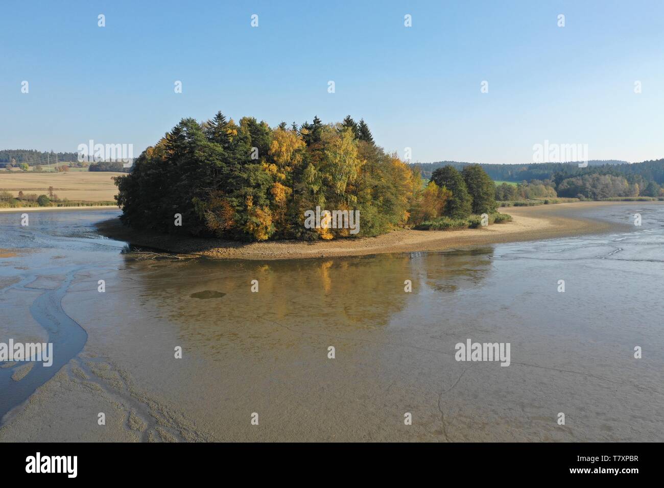 Aerial photo of dry drained breeding pond with mud. Carps, perch, roach ...