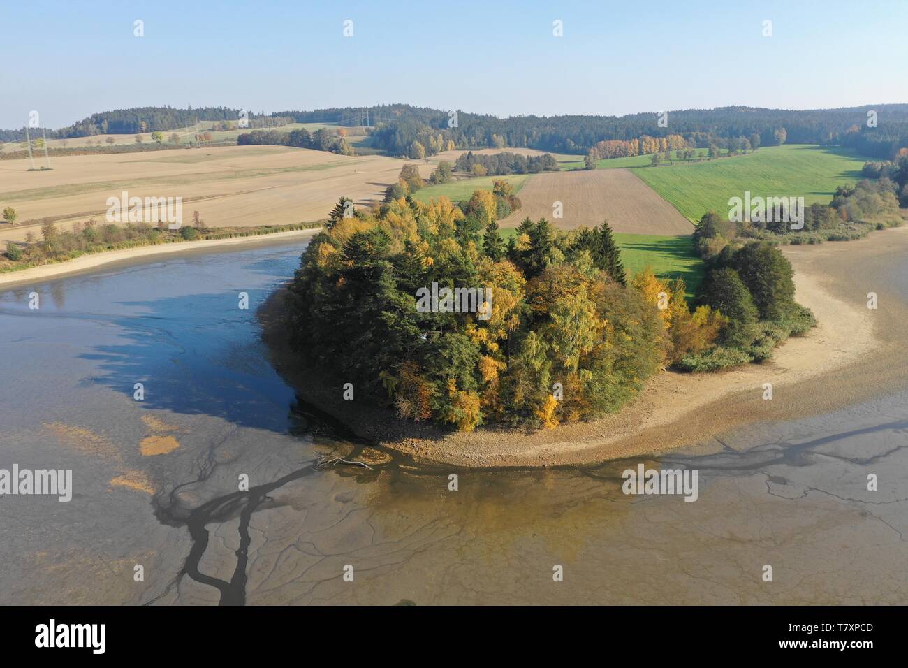 Aerial photo of dry drained breeding pond with mud. Carps, perch, roach ...