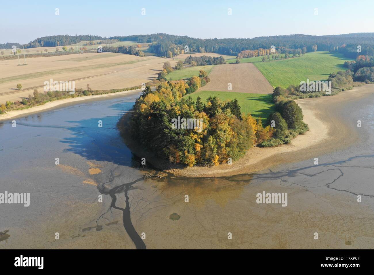 Aerial photo of dry drained breeding pond with mud. Carps, perch, roach ...