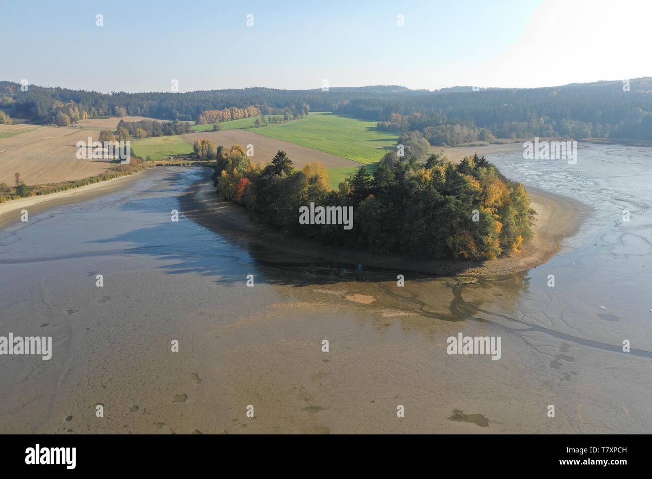 Aerial photo of dry drained breeding pond with mud. Carps, perch, roach ...